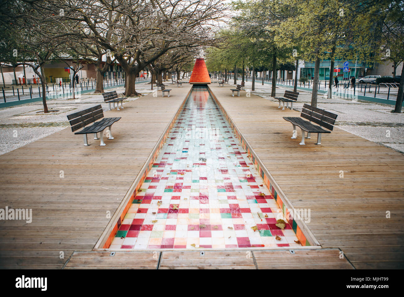 avenue or pedestrian street with fountain or modern architectural art ...