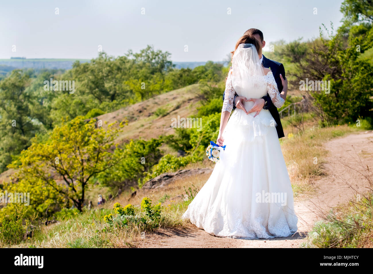 Guests Throwing Confetti Over Bride And Groom At Wedding, civil, indian ...
