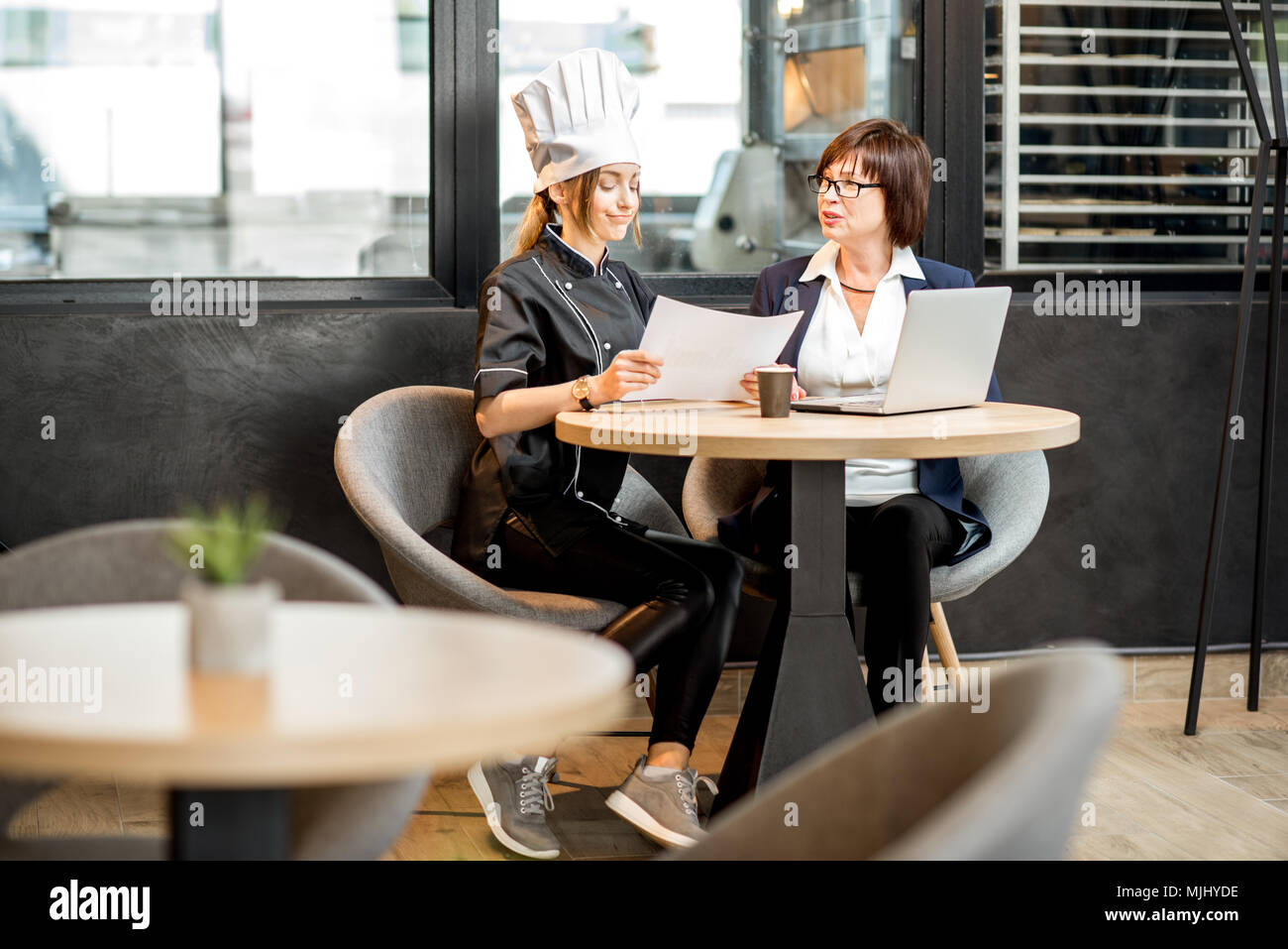 Older woman professional chef hi-res stock photography and images - Alamy