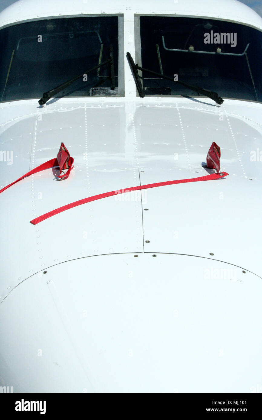 nose of white aircraft with red markers on pitot intakes Stock Photo ...