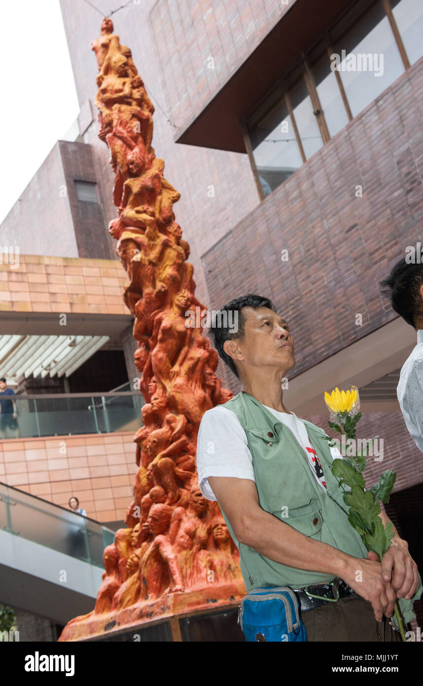 Annual cleaning of Danish artist Jens Galschiot's "Pillar of Shame" at ...