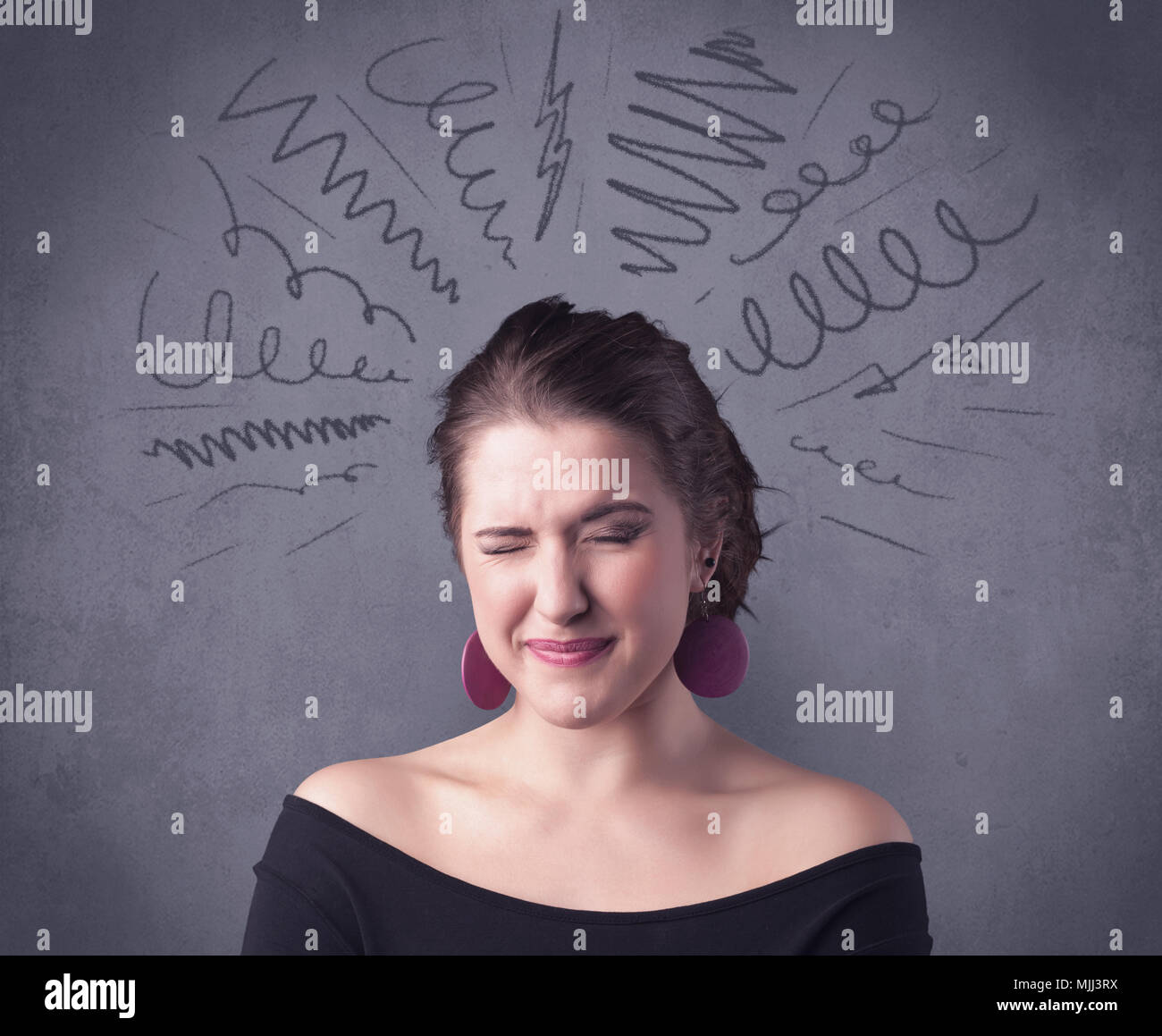 A cute female student making funny face expressions with pressure and ...