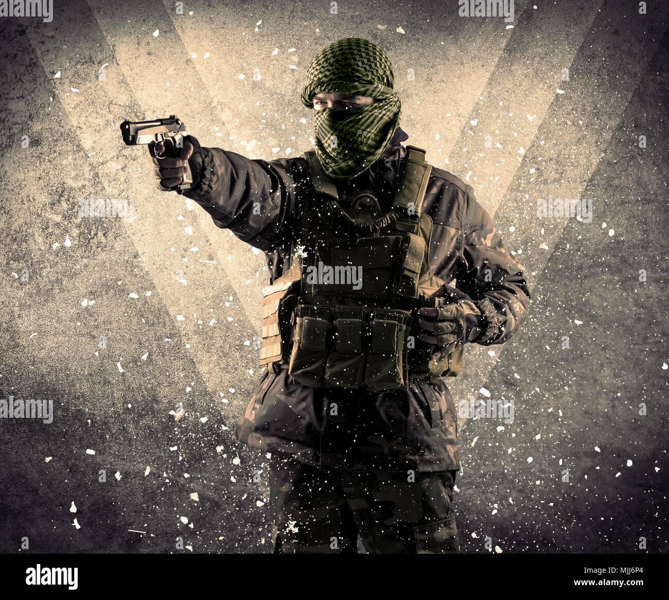 Portrait of a dangerous masked armed soldier with grungy light ...