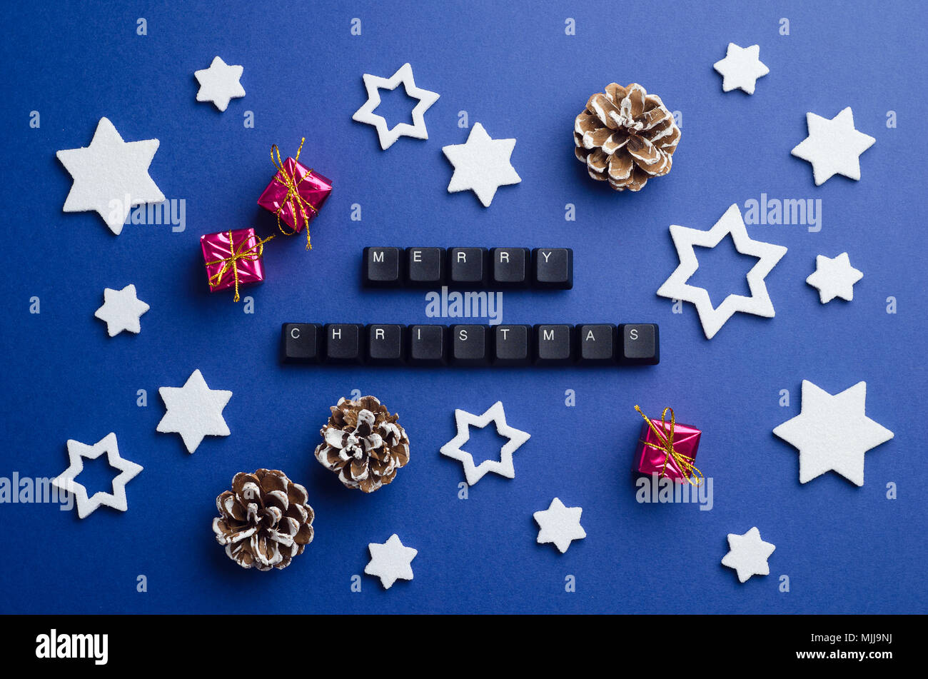 Merry Christmas text made of keyboard keys and other christmas ...