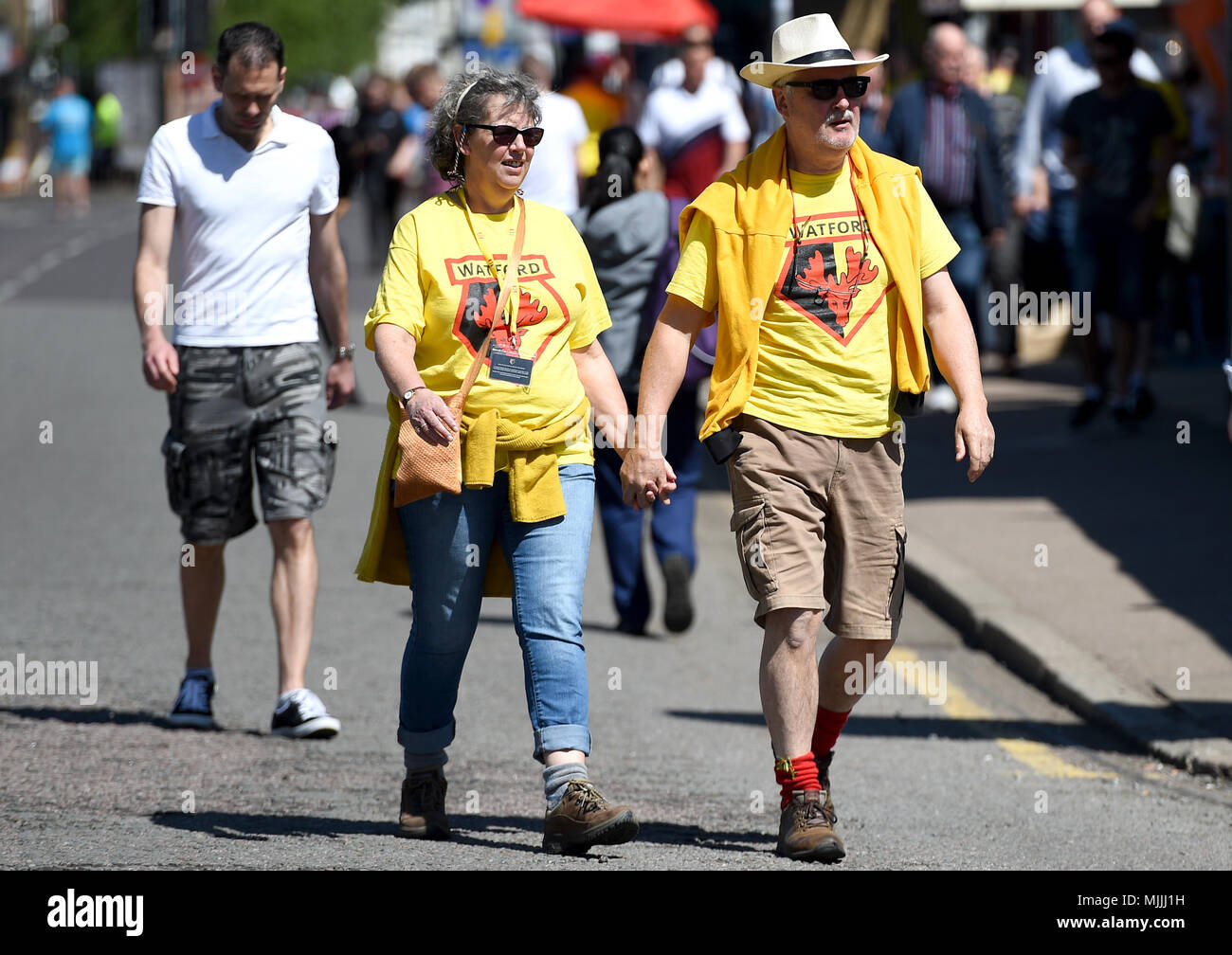 Watford fans make their way to the stadium before the Premier League ...