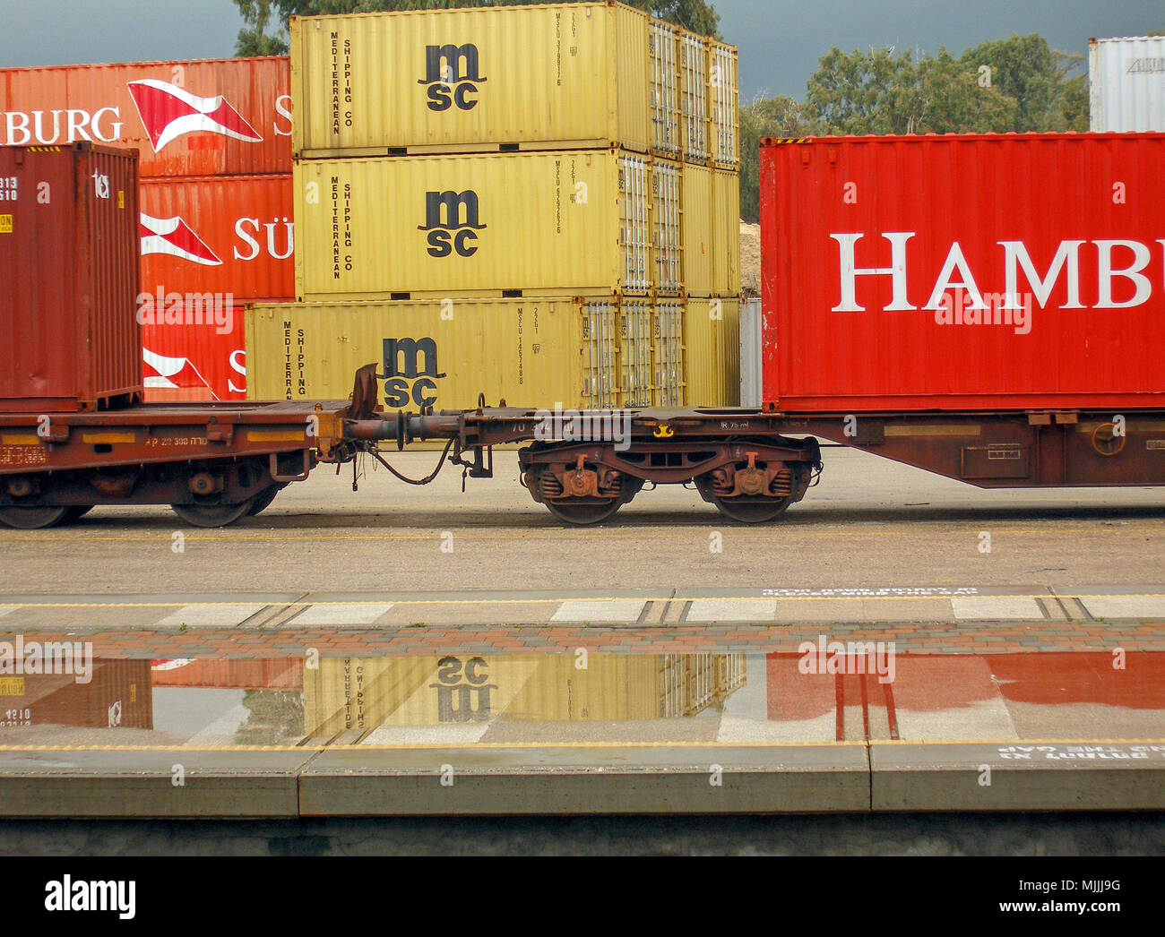 Israel Rail. Hadera Train station. Cargo trains with containers are ...