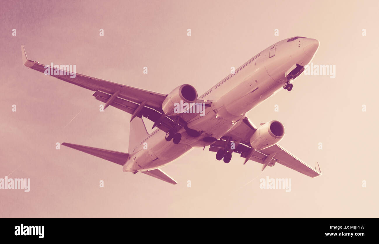 Large passenger airplane taking off from airport during day Stock Photo ...