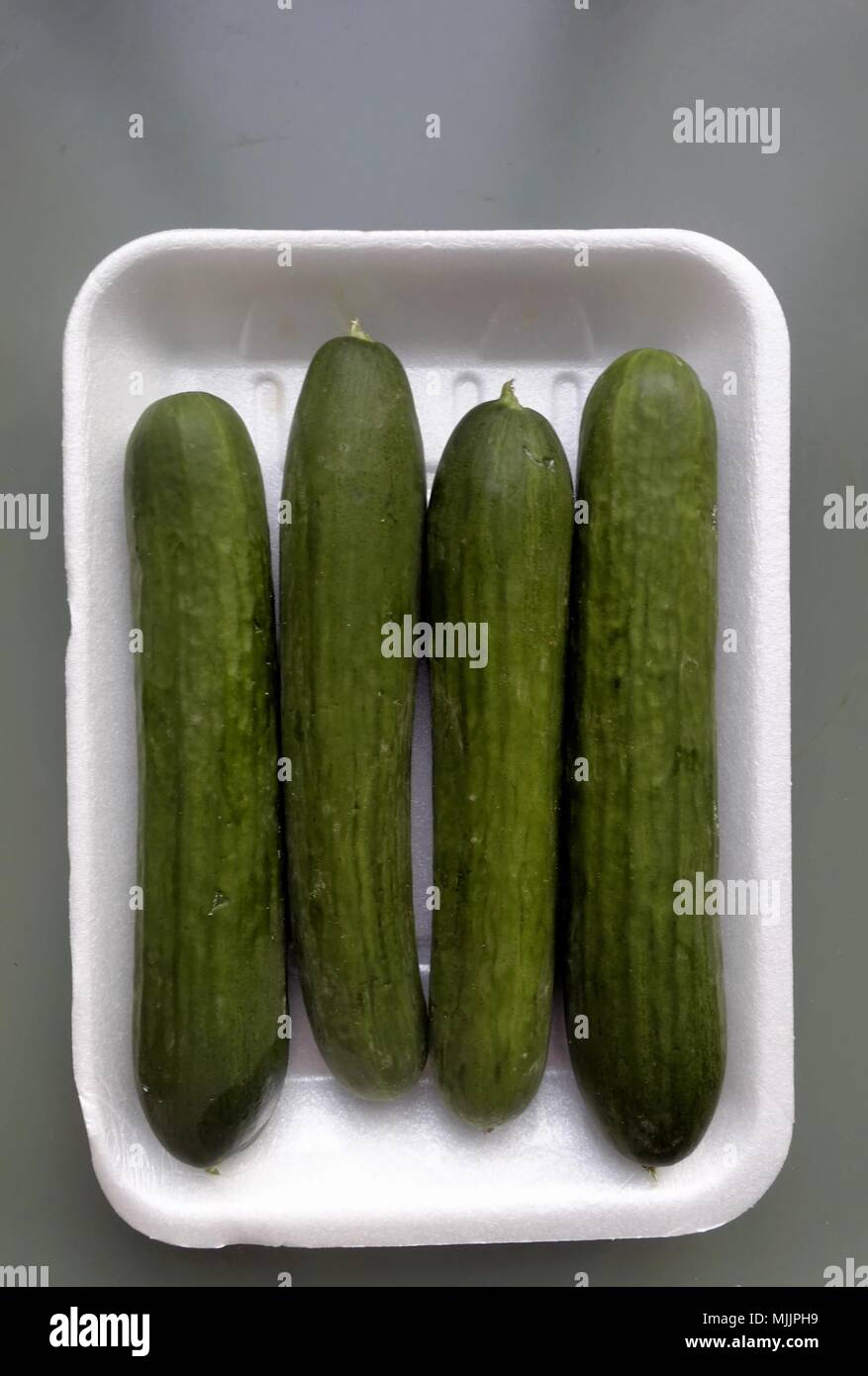 Carton of Biologically grown Cucumbers from a local Greengrocers, Crete ...