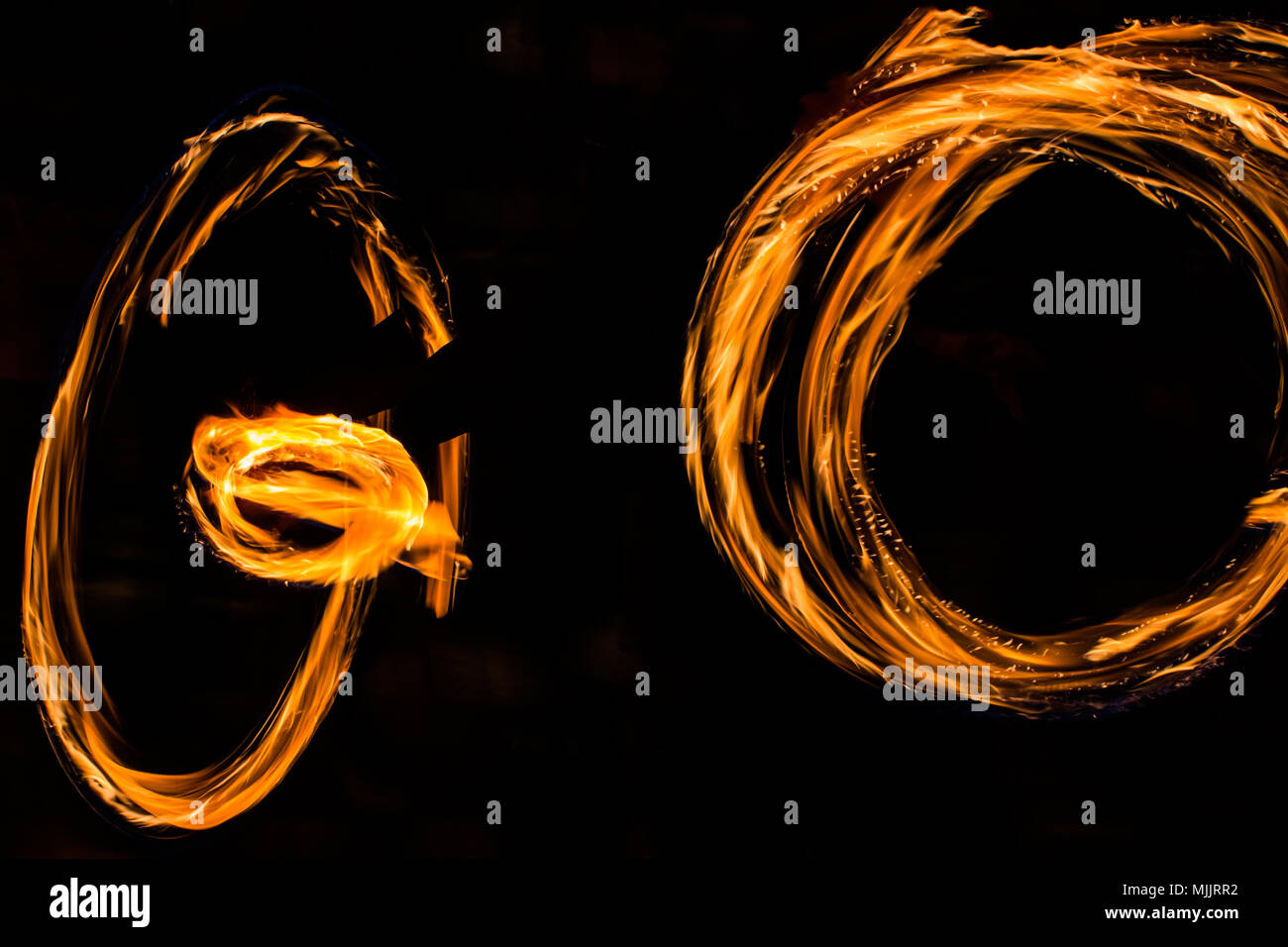 Fire dancers Swing fire dancing show fire show dance man juggling with ...