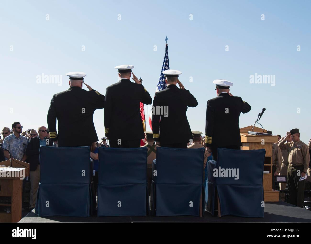 171201-N-UG095-042 SAN DIEGO (Dec. 01, 2017) The official party renders ...