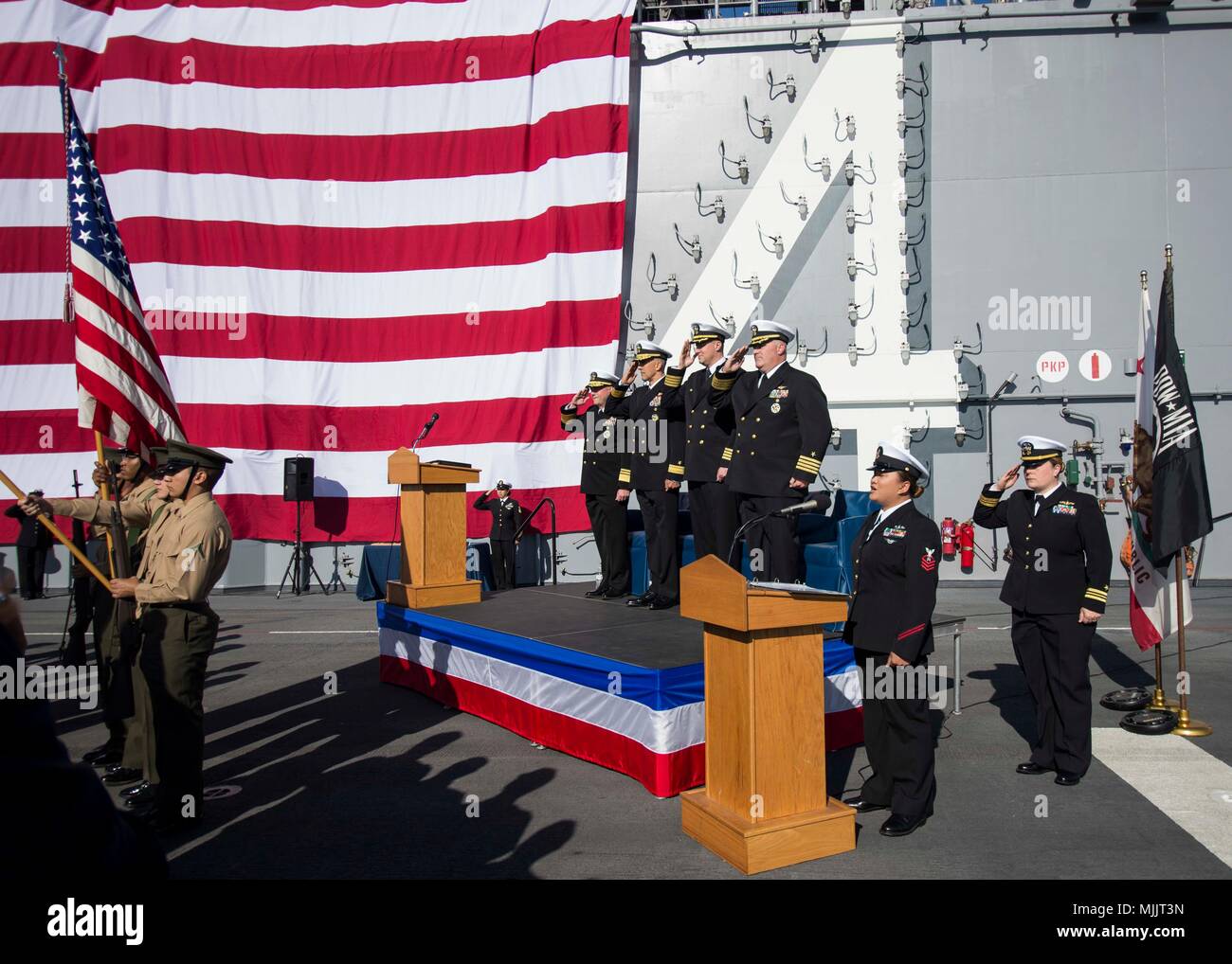 171201-N-UG095-046 SAN DIEGO (Dec. 01, 2017) The official party renders ...