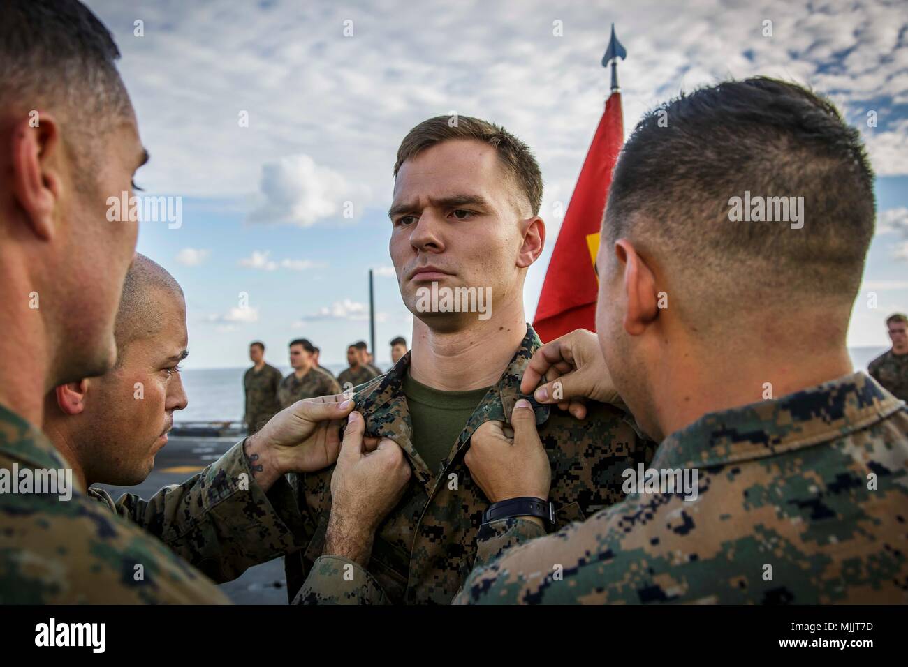 U.S. Marine Corps Sgt. Joshua A. Kidd, center, an antitank missleman ...