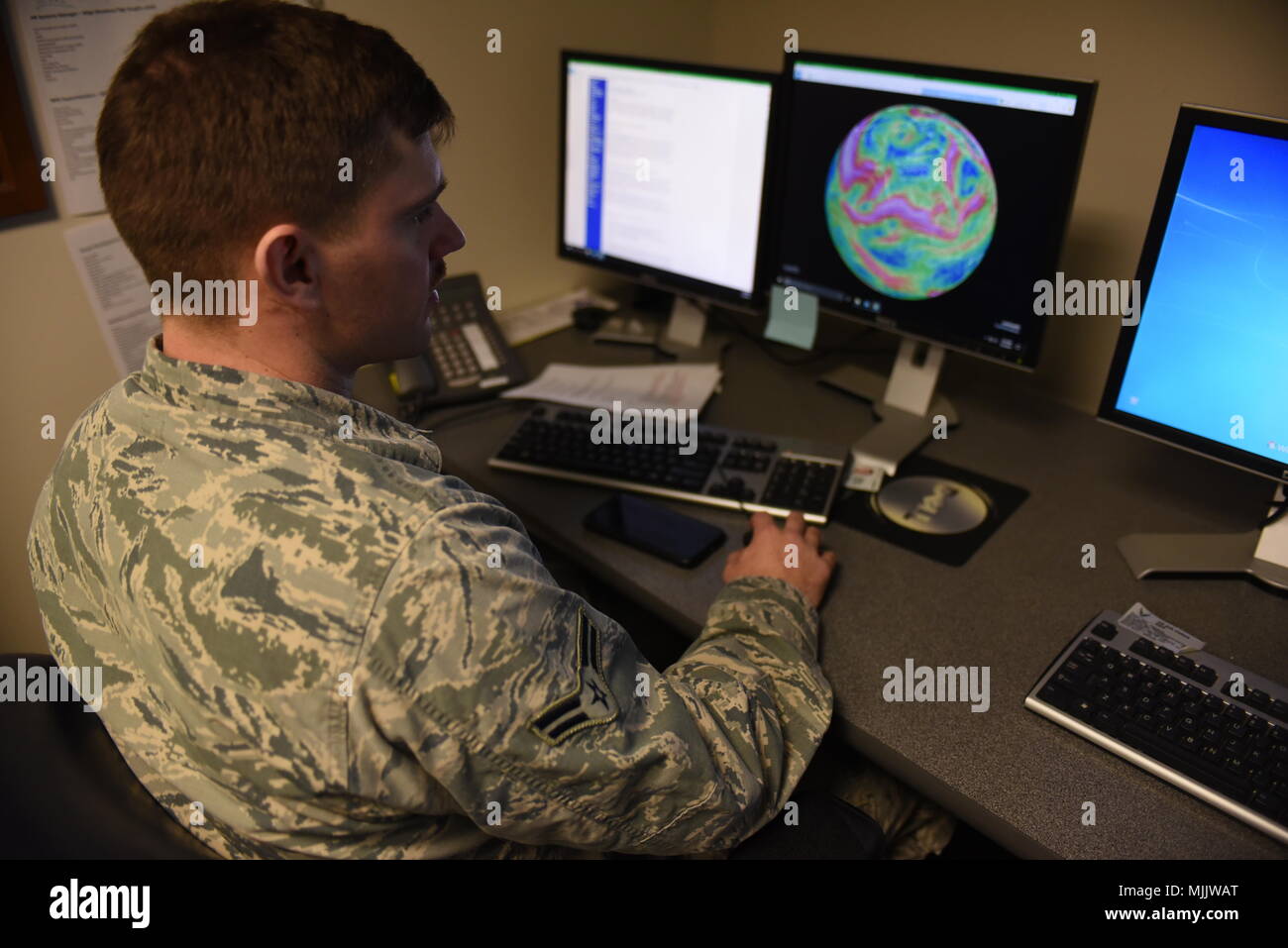 National guardsmen from the 202nd Weather Flight, 102nd Intelligence ...