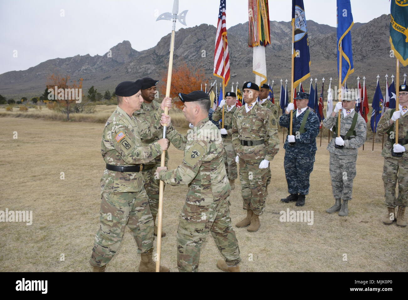 Command Sgt. Maj. William K. Maddox (right) passes the Noncomissioned ...
