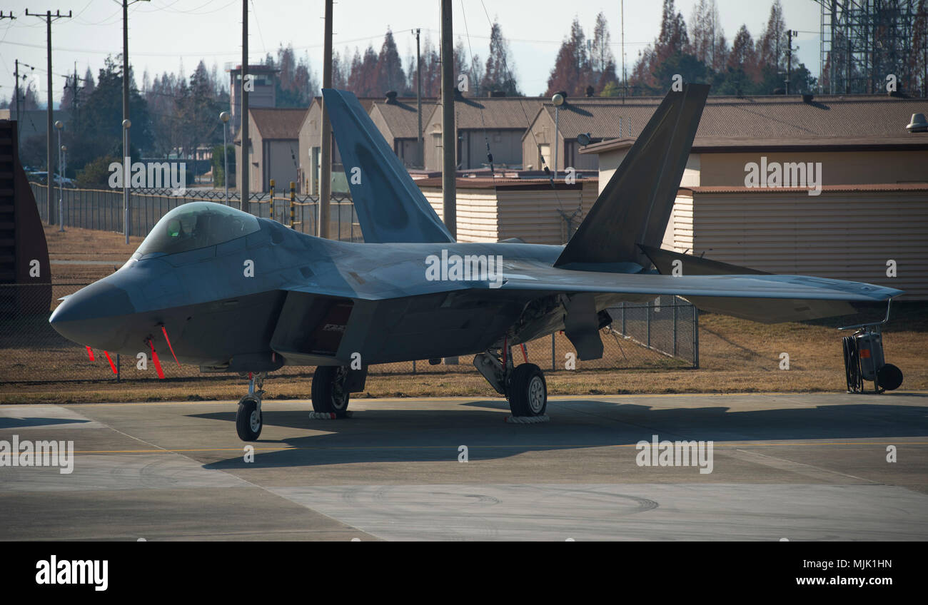 A U.S. Air Force F-22 Raptor stands by on the ramp Dec. 6, 2017 at ...