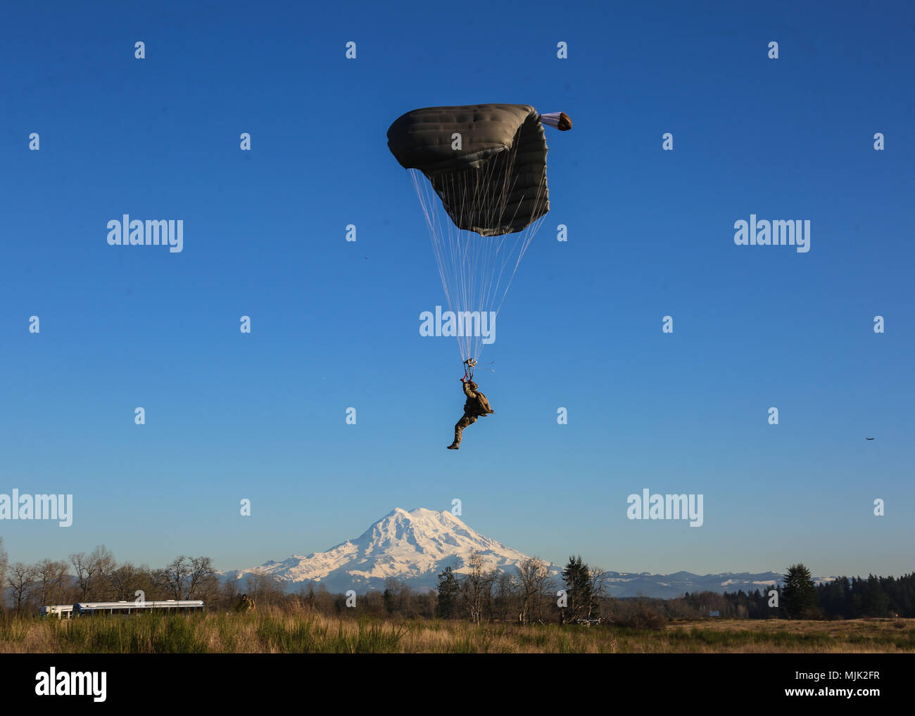 A Paratrooper assigned to 1st Special Forces Group (Airborne) prepares ...