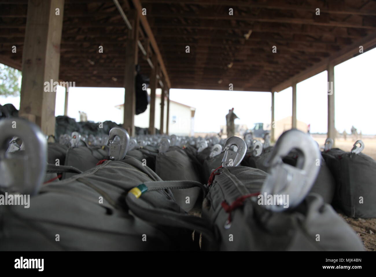 U.S Army Paratroopers performs chute shake-out after their descent for ...