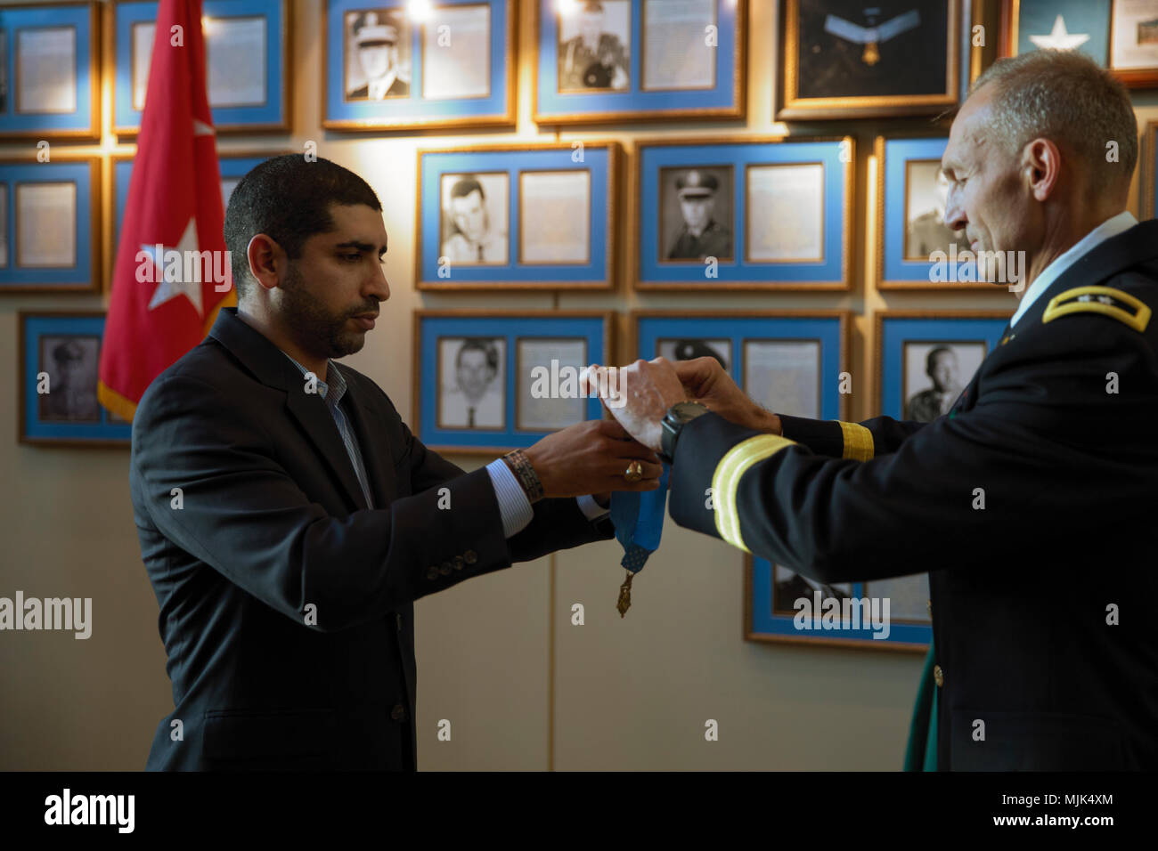 Capt. (R) Florent Groberg presents his Medal of Honor to Maj. Gen ...