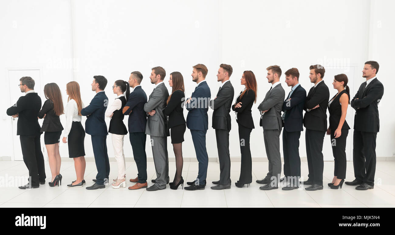 large business team standing one behind the other Stock Photo - Alamy