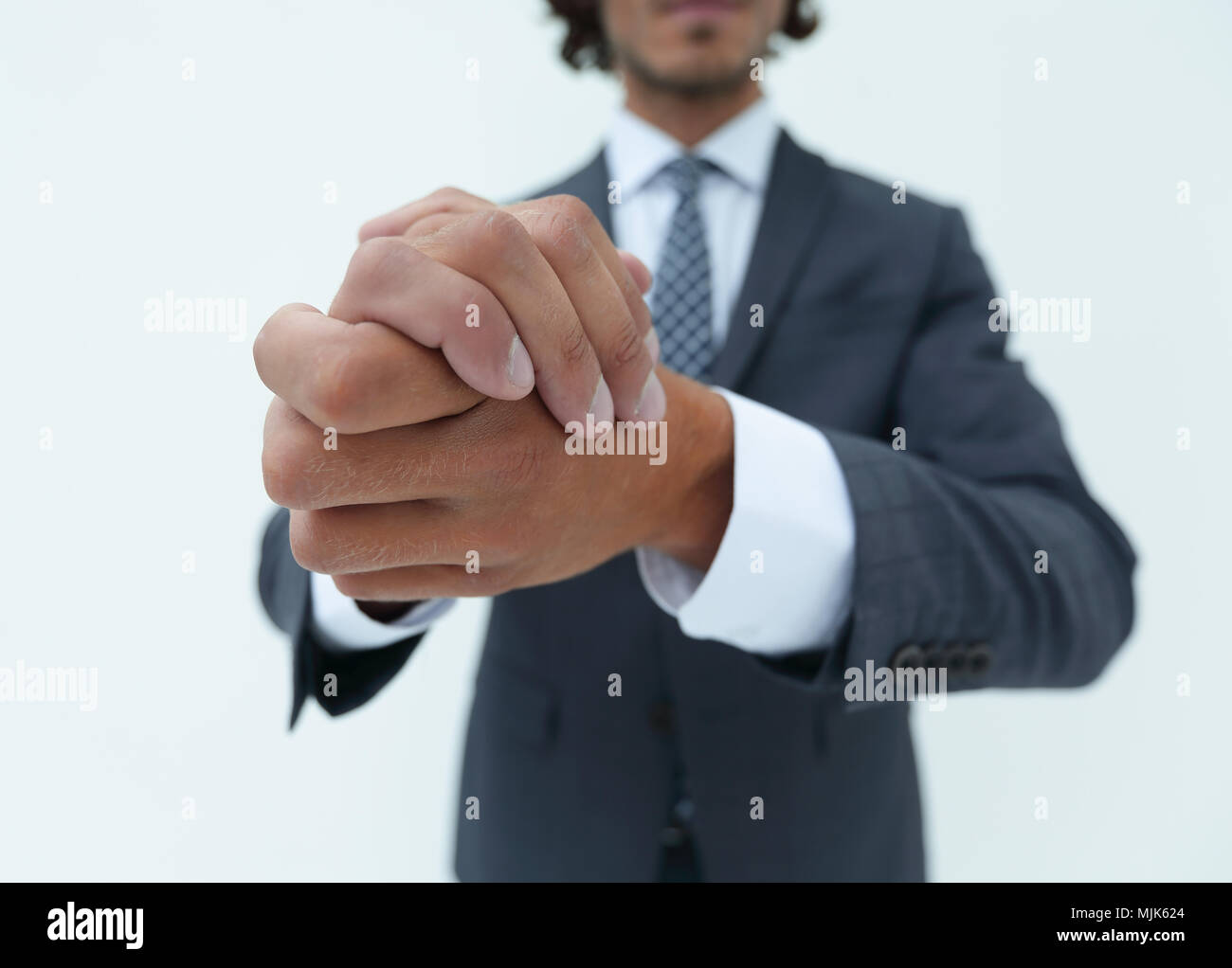 Close up on male clenched hands Stock Photo - Alamy