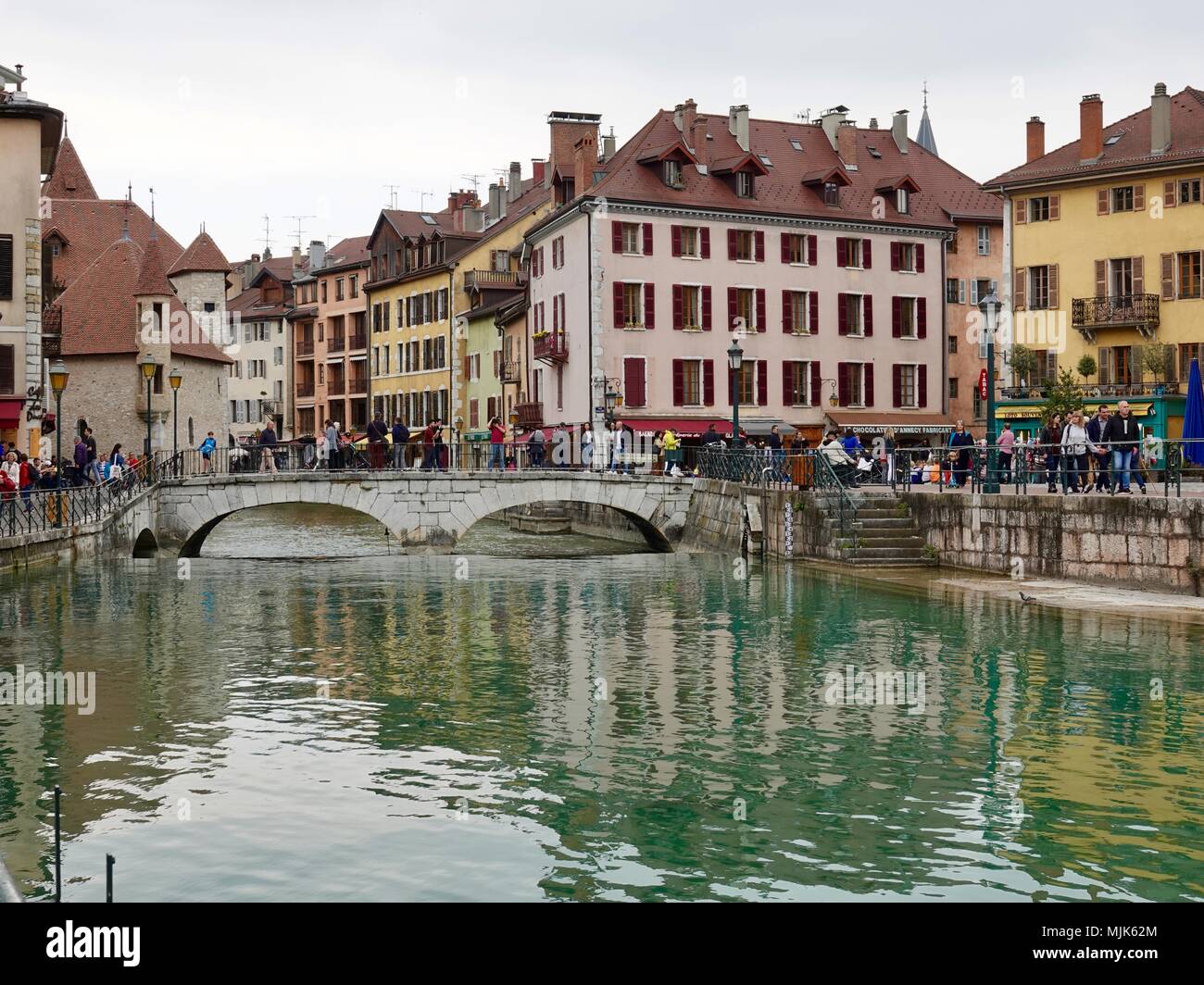 Tourists, visitors, in the old alpine town area Annecy, France with ...