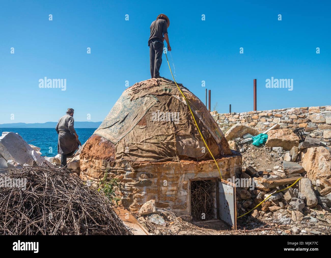 Monks working hi-res stock photography and images - Alamy