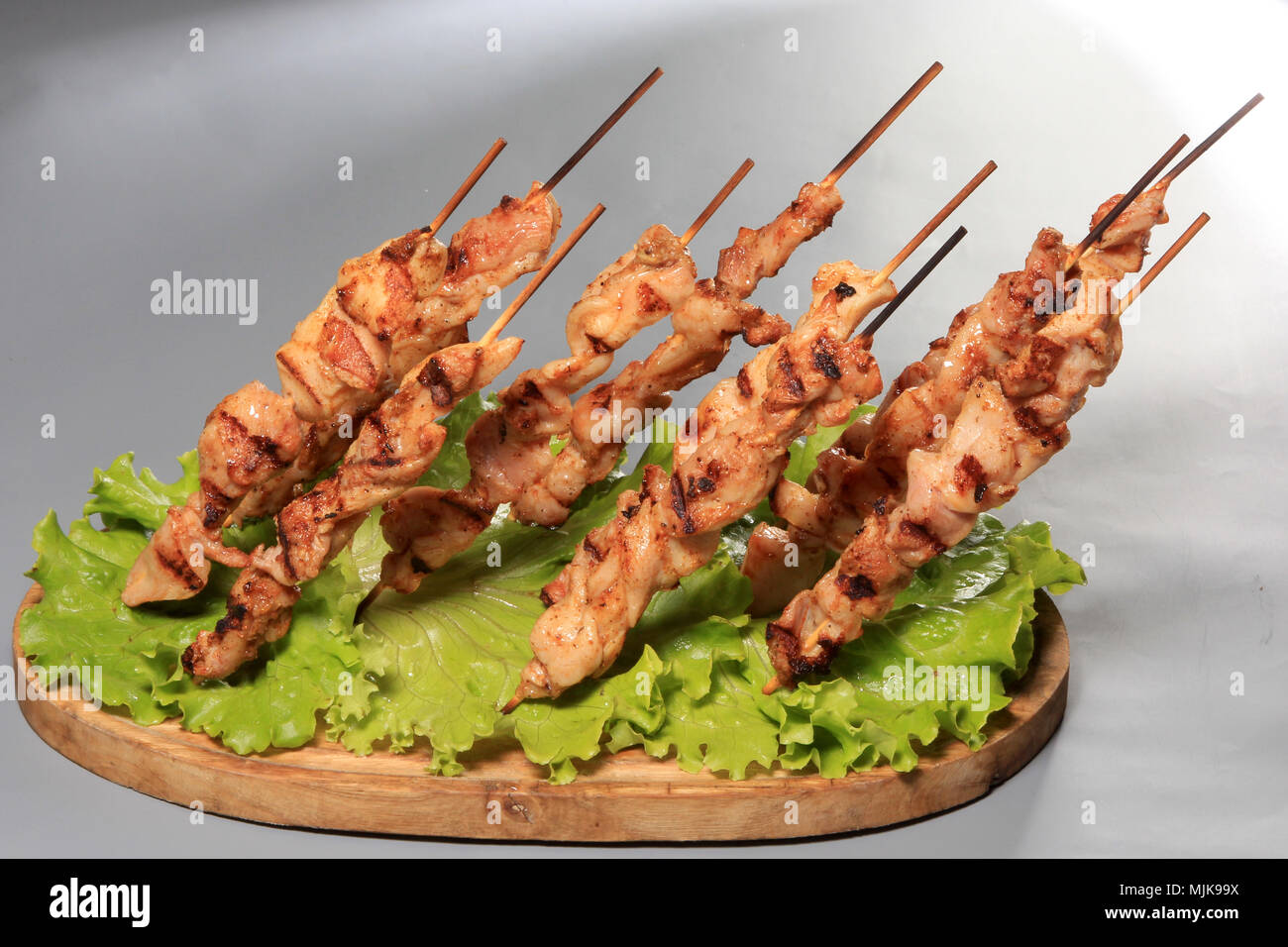 skewers pinned on a wooden board Stock Photo - Alamy