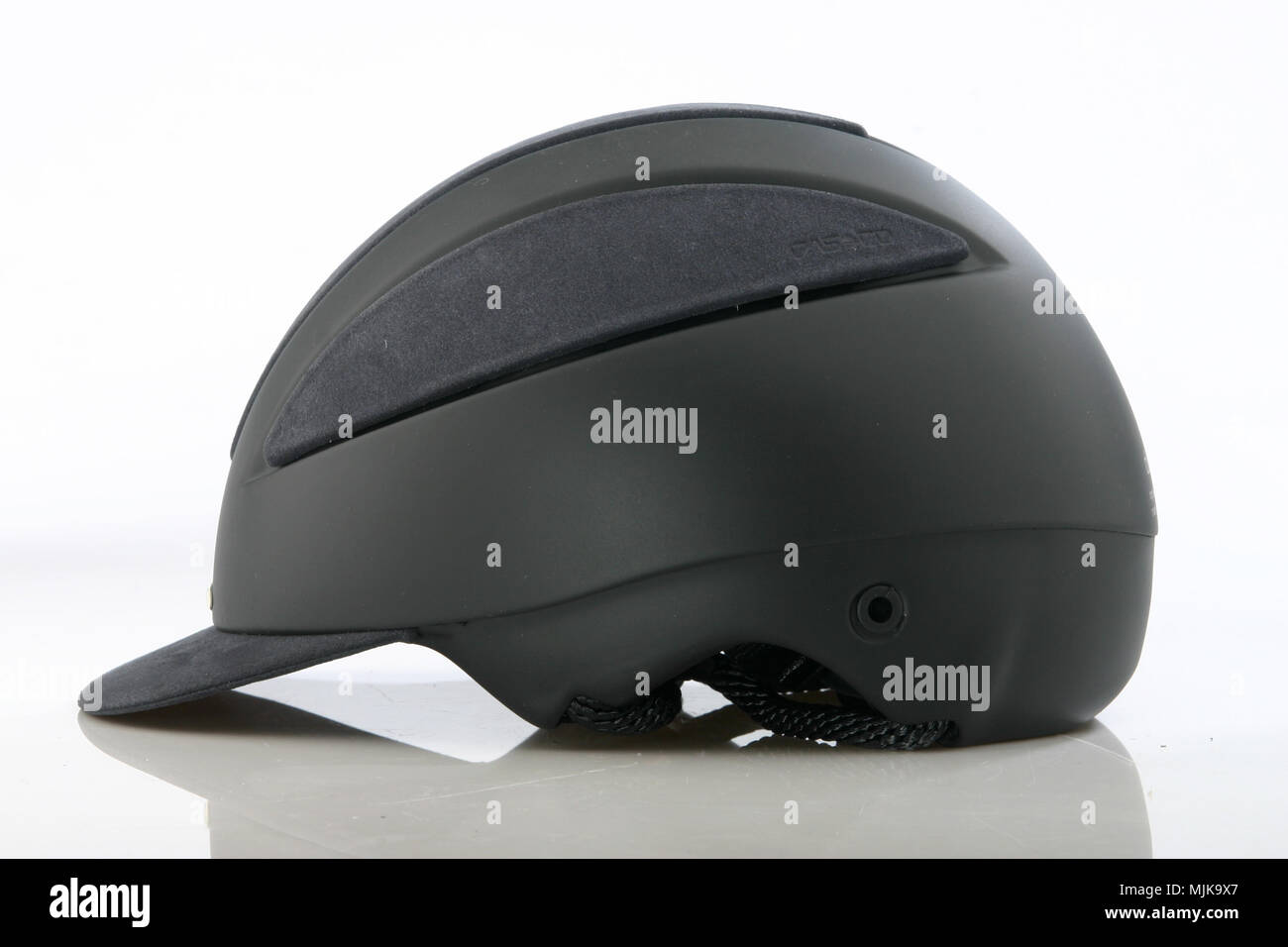 Black helmet on white background Stock Photo - Alamy