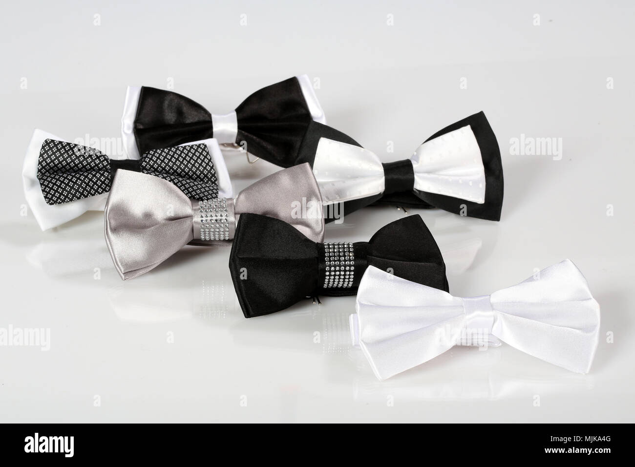 bow ties on white background Stock Photo - Alamy