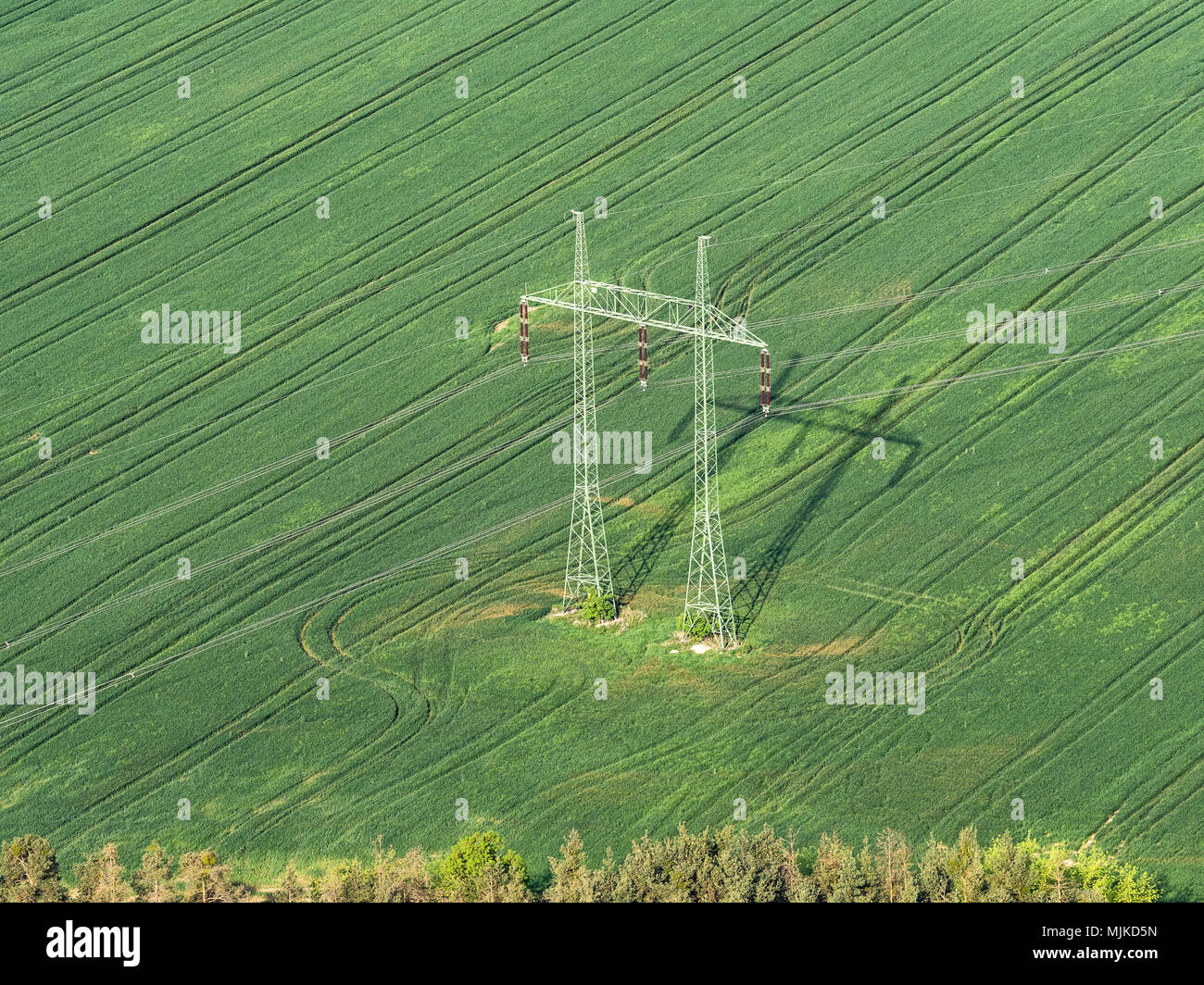 Mast electrical power line in field , aerial view from balloon on high ...