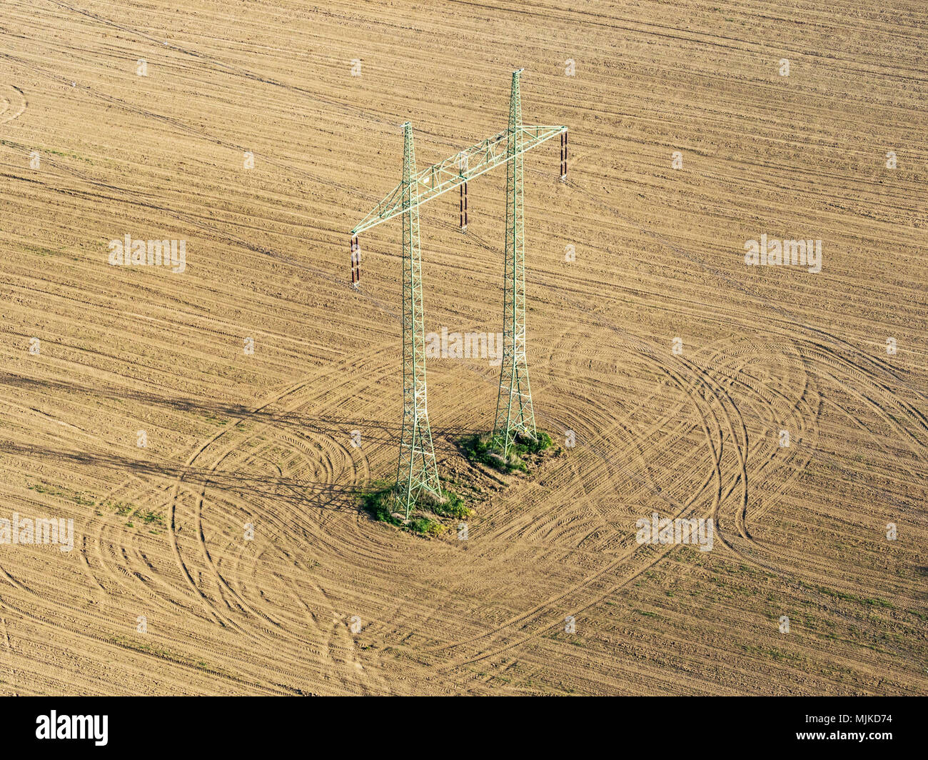 Mast electrical power line in field , aerial view from balloon on high ...