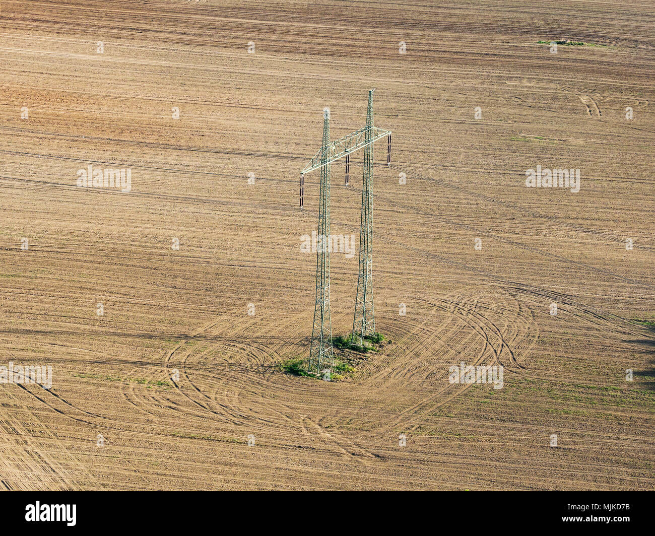 Mast electrical power line in field , aerial view from balloon on high ...