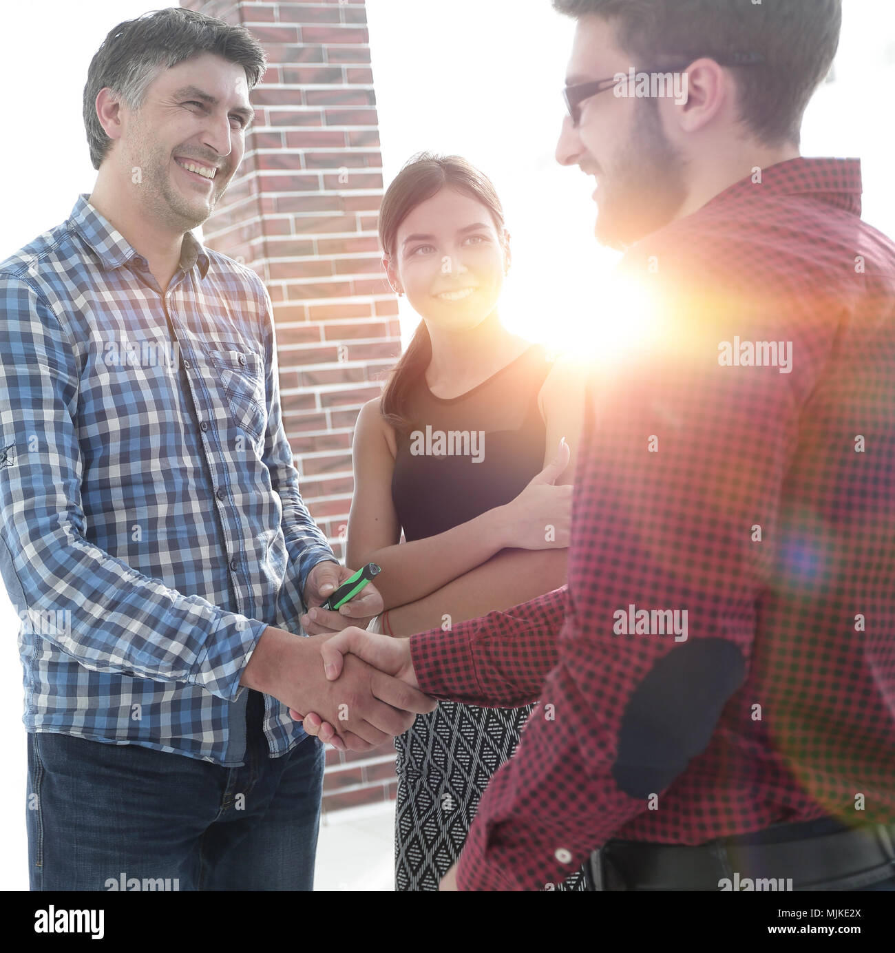 Creative people handshake introduction hi-res stock photography and ...