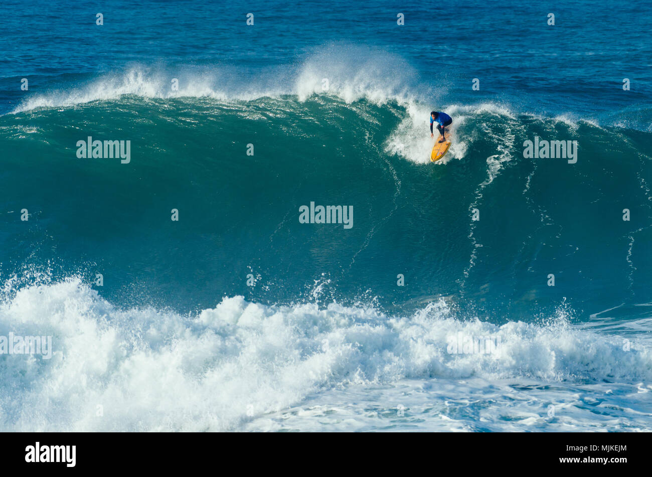 Huge wave surfer hi-res stock photography and images - Alamy