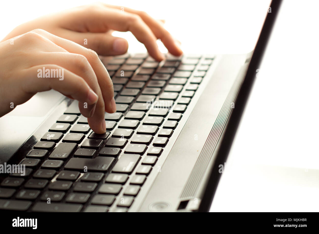 Hands typing on laptop computer Stock Photo - Alamy
