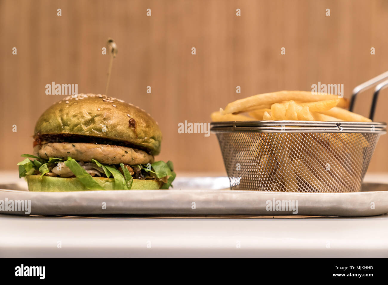 Chicken Hamberger with fries fast food Stock Photo - Alamy