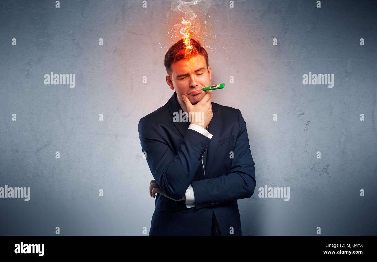Fever businessman with burning head concept Stock Photo - Alamy
