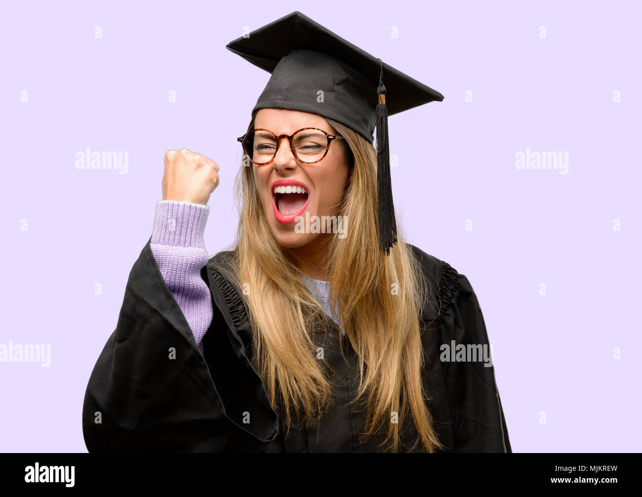 Young woman university graduate student irritated and angry expressing ...