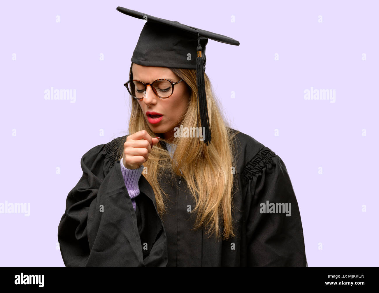 Young woman university graduate student sick and coughing, suffering ...