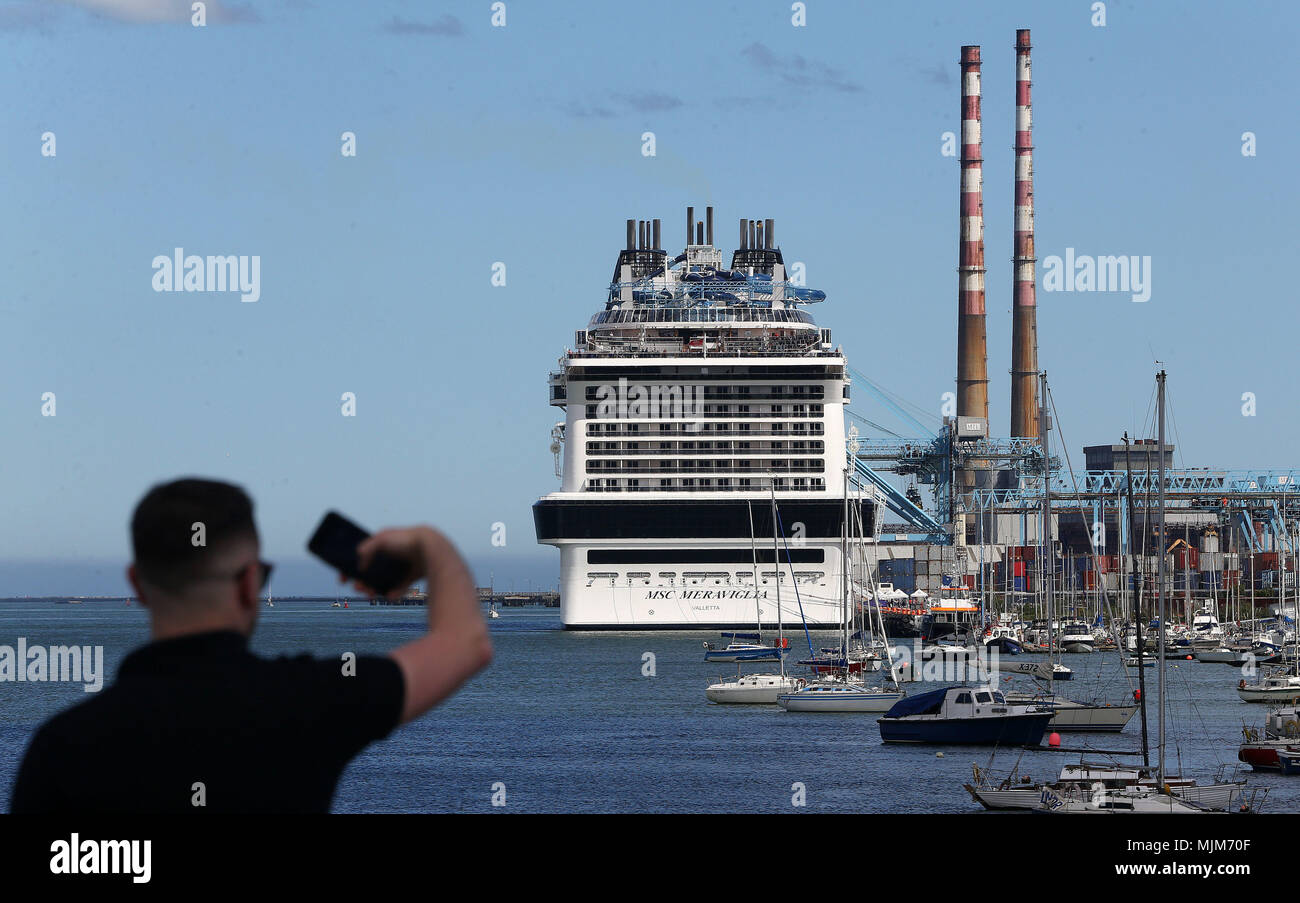 People take pictures of the MSC Meraviglia as it's docked in Dublin ...
