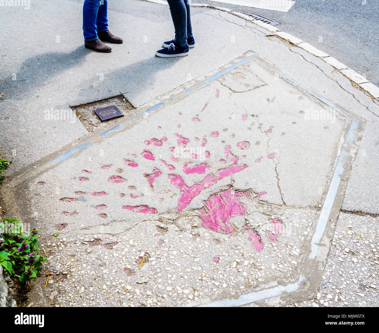 Markings on the streets of Sarajevo indicating where mortar shells ...