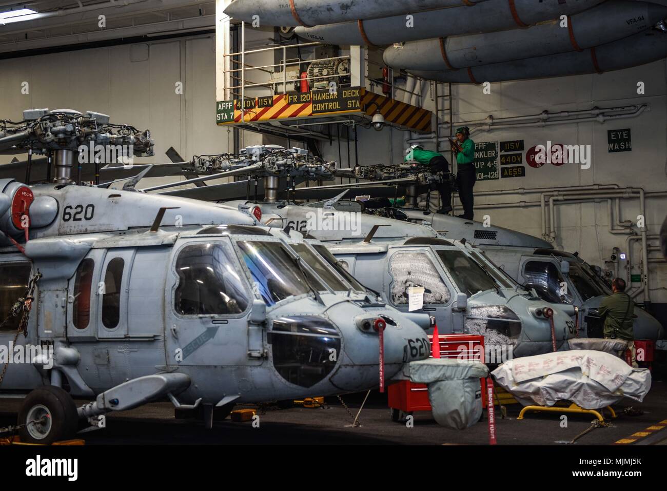 171209-N-GP724-2011 ARABIAN GULF (Dec. 9, 2017) Sailors adjust a rotor ...
