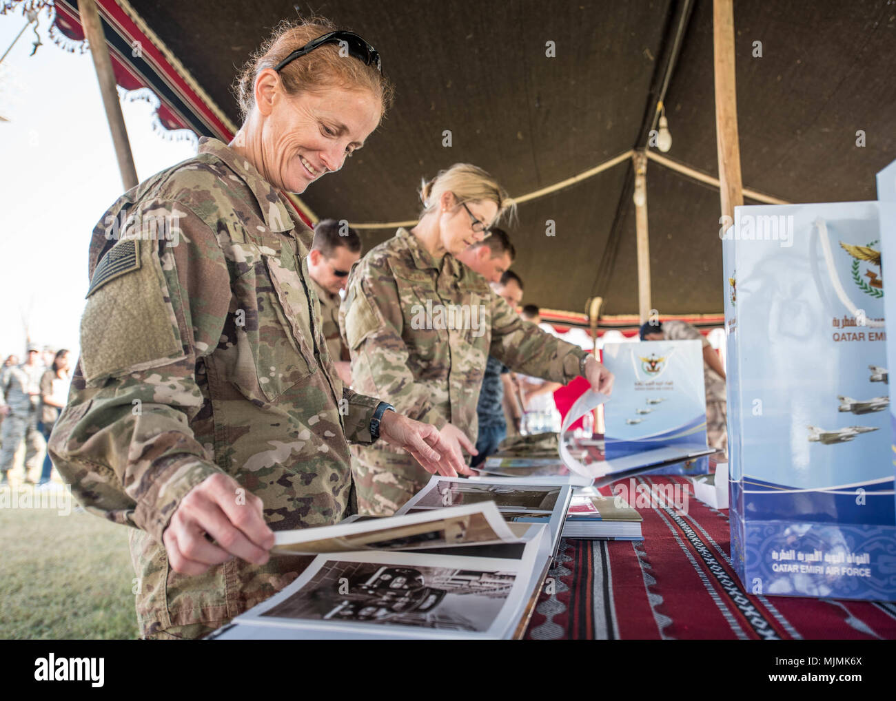U.S. Air Force Lt. Col. Beth Dion (left), deputy group commander of the ...