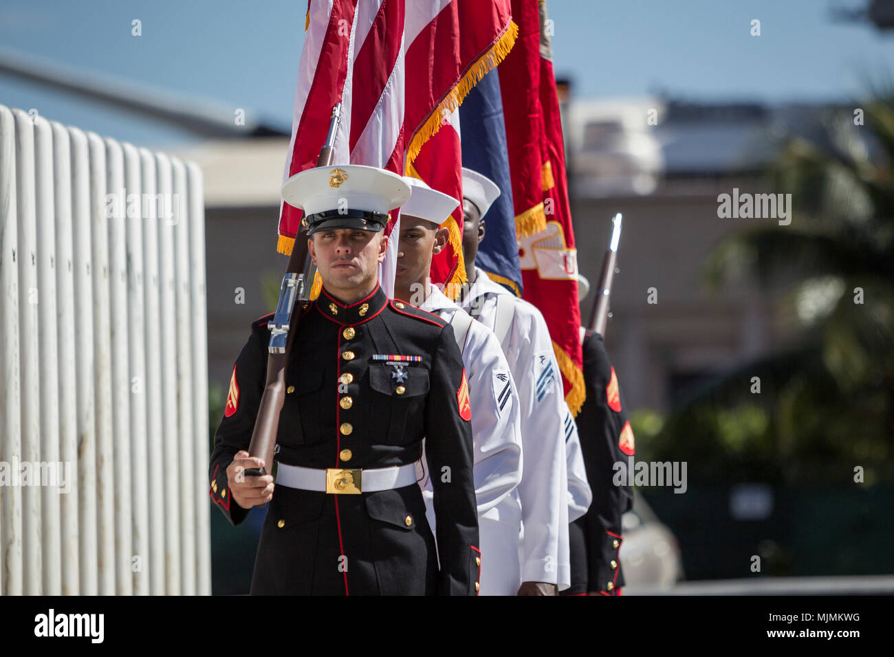 Sailors and Marines of the Joint Service Color Guard prepare to present ...