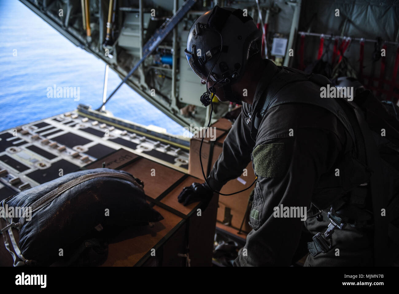 Tech. Sgt. Napoleon Ortiz, a loadmaster with the 36th Airlift Squadron ...