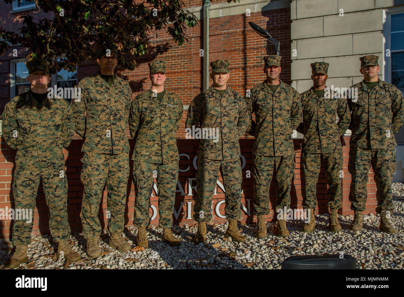 U.S. Marine Corps Cpl. Mason Spivey, 3rd Battalion, 2nd Marines, left ...