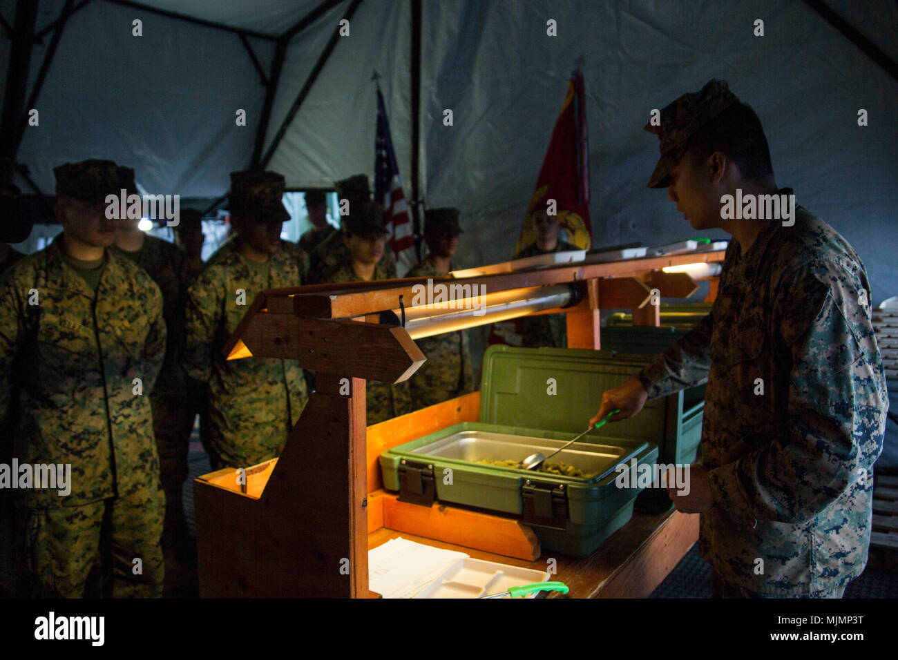 U.S. Marine Corps Sgt. William Ragiles a chief cook with Food Service ...