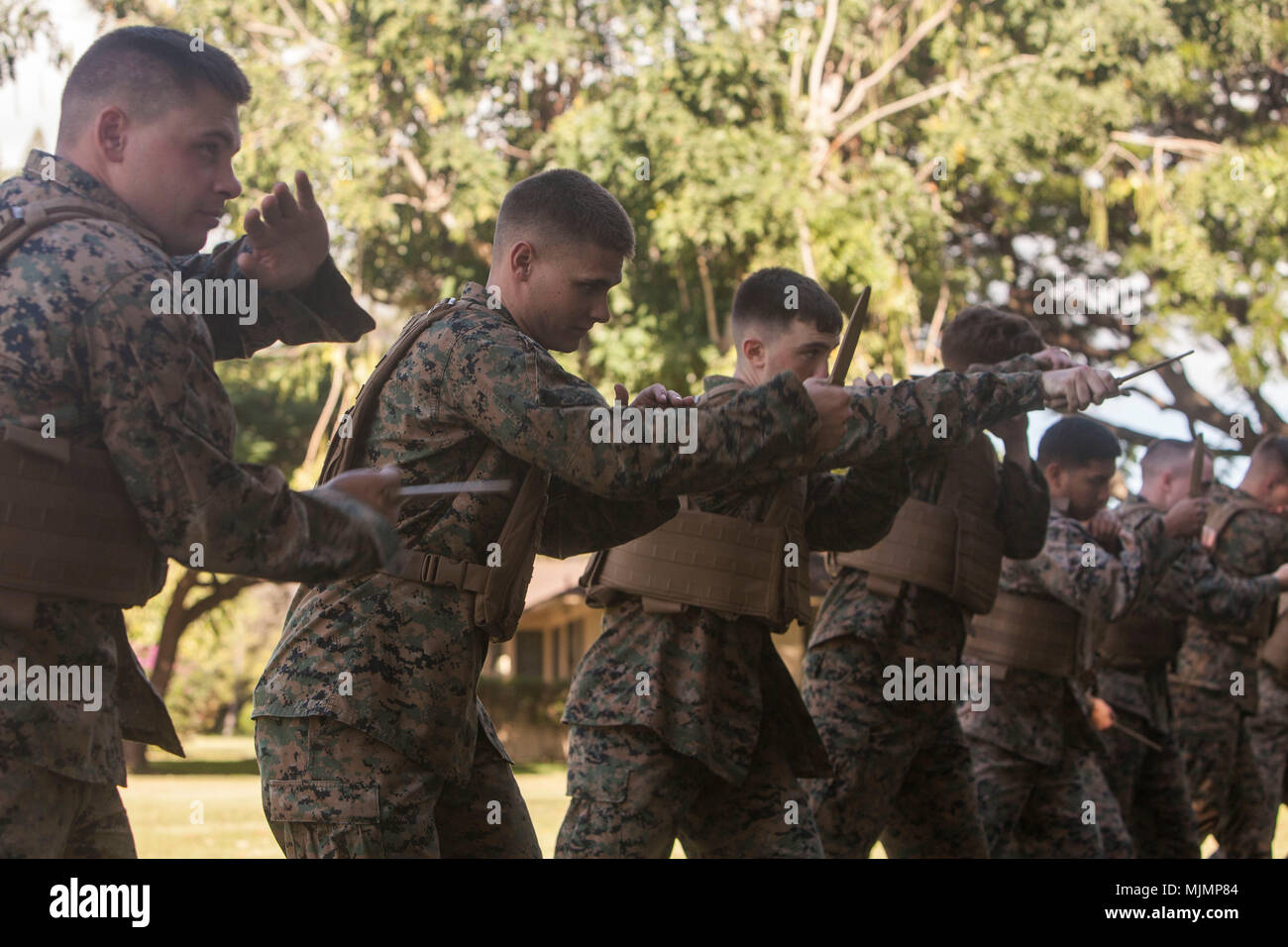 U.S. Marines with 3rd Radio Battalion perform knife strikes during Marine Corps Martial Arts ...