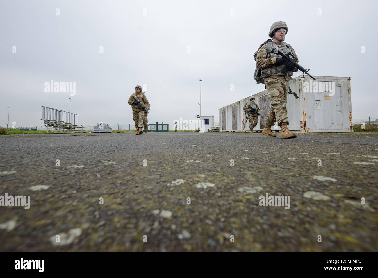 U.S. Soldiers with 39th Strategic Signal Battalion patrol in diamond ...