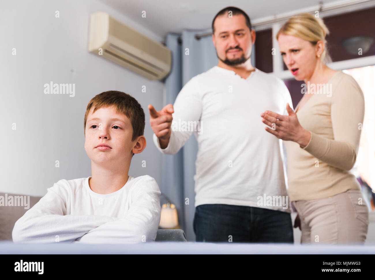 Parents punishing hi-res stock photography and images - Alamy